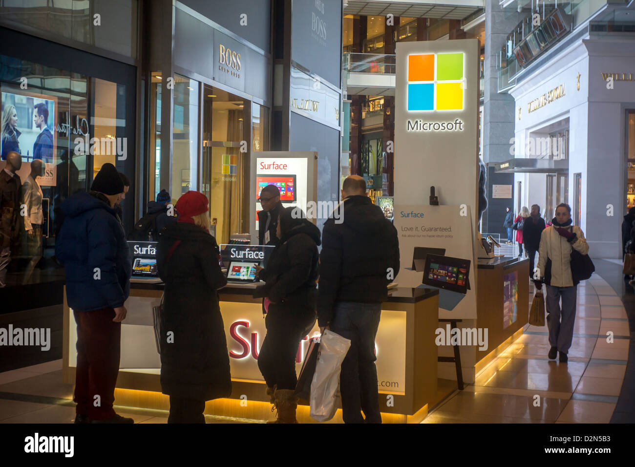 Shoppers at the Microsoft kiosk in the Time Warner Center in New York ...
