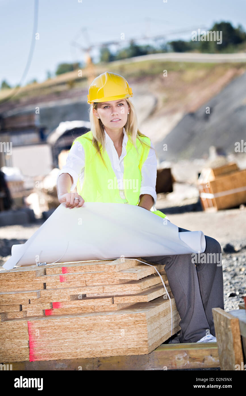 A young female constructor at building of a neu motorway in Germany ...