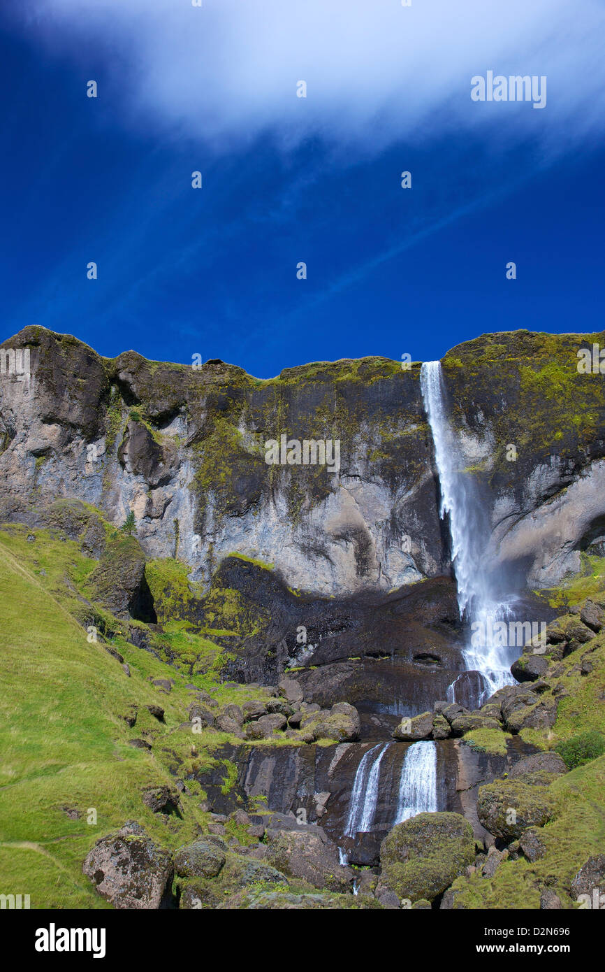 Waterfall in summer sunshine at Foss a Sidu, South coast, Iceland ...