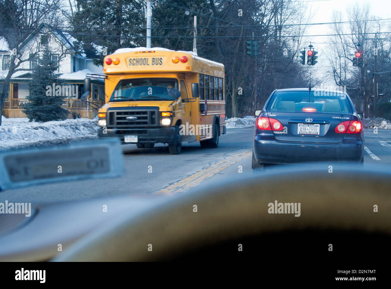 Schoolbus in intersection Stock Photo - Alamy