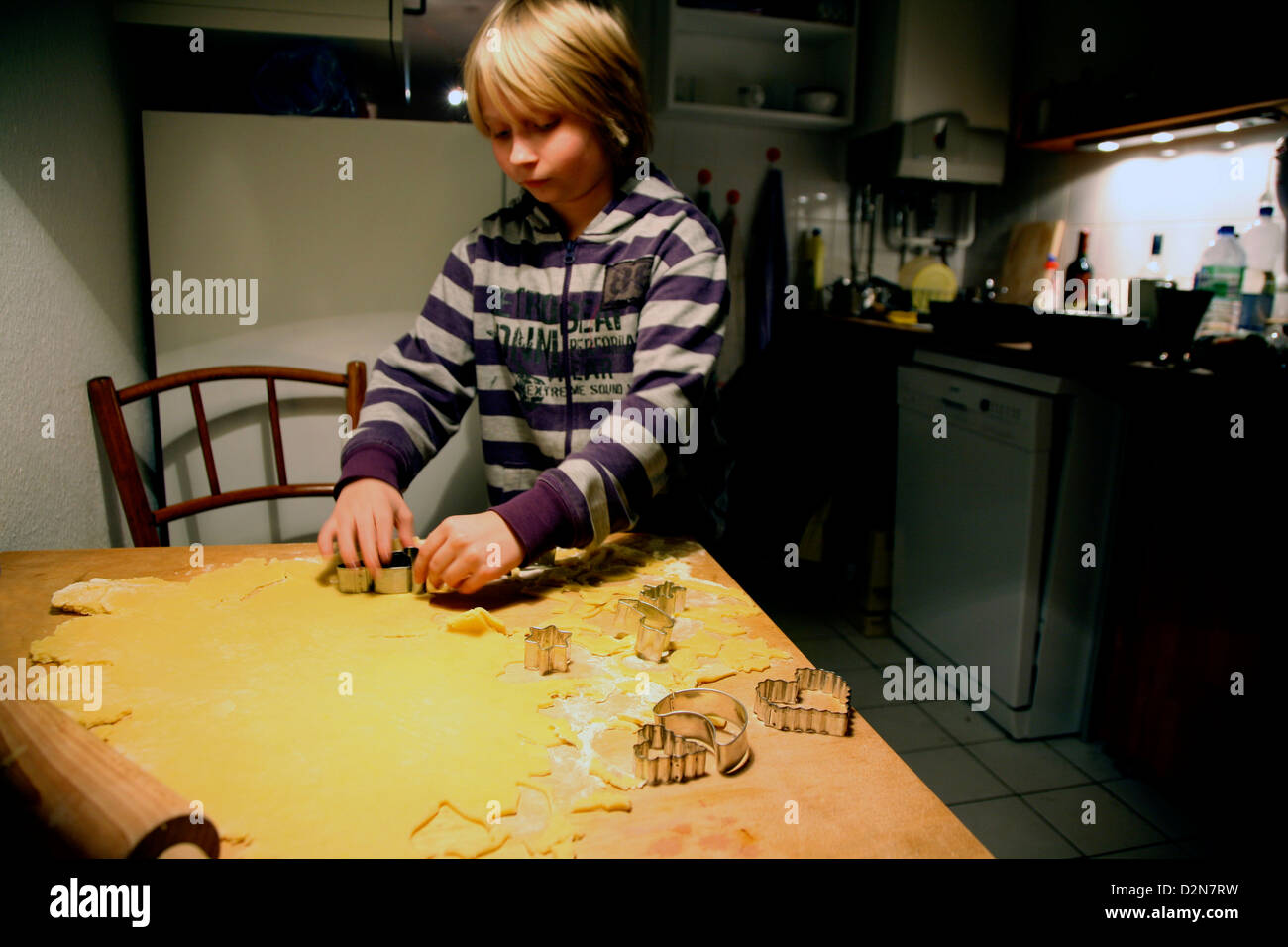 Boy bakes cookies Stock Photo - Alamy