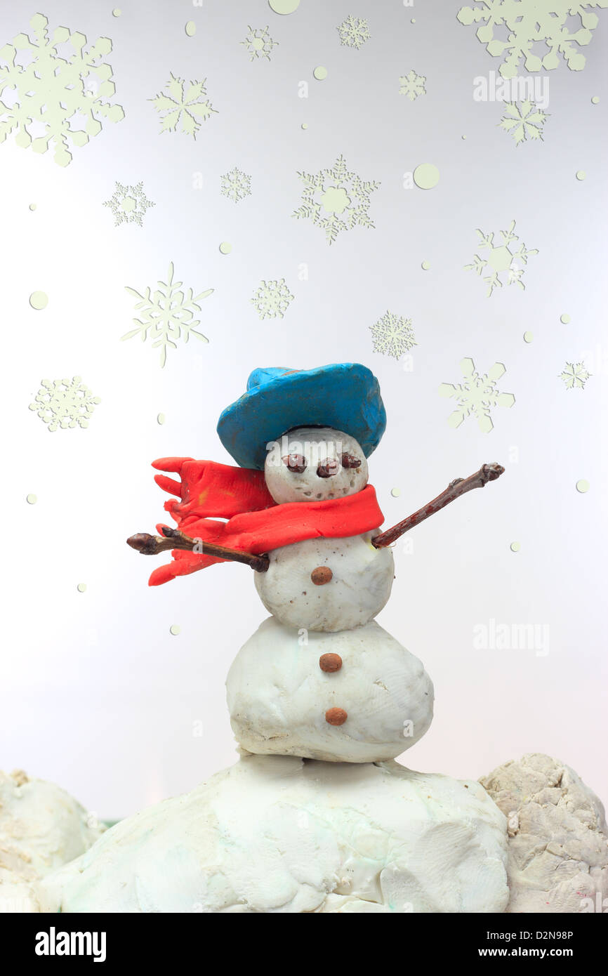 snowman made in plasticine in winter scene Stock Photo - Alamy