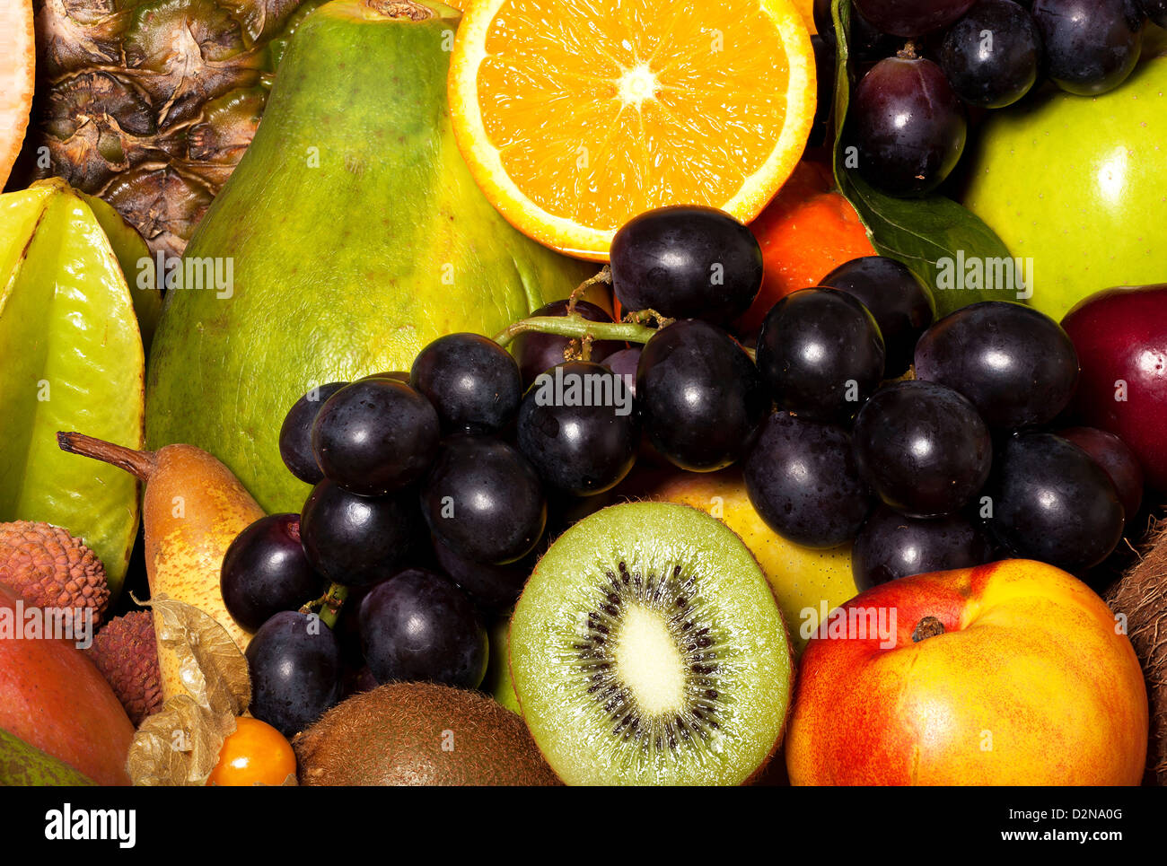 Background from many different exotic fruits Stock Photo - Alamy
