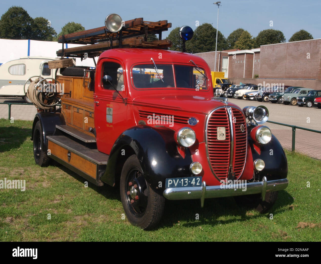 The 1956 Ford Fire Engine is a vintage firefighting vehicle, featuring ...
