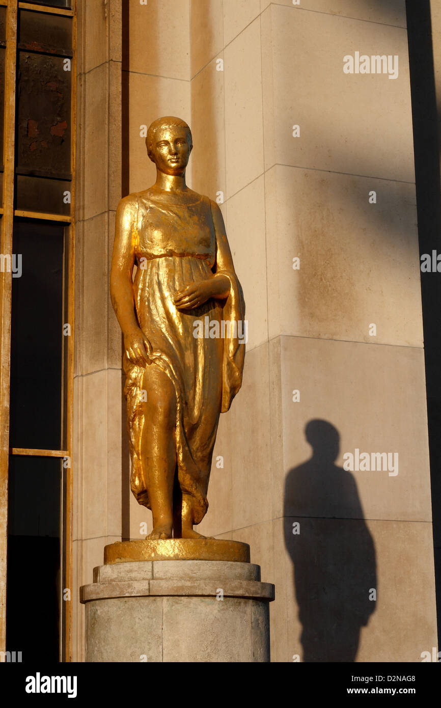 Gilded bronze statue of a man In the central square of the Palais ...