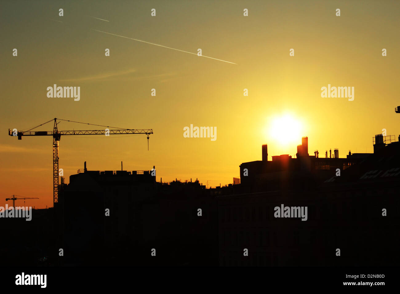 Golden Sunset Behind The Buildings Stock Photo - Alamy