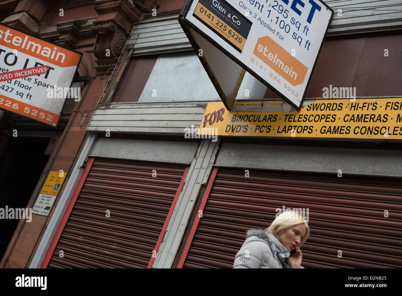 Rundown streets, To Let signs, and boarded up shops, in the City centre ...