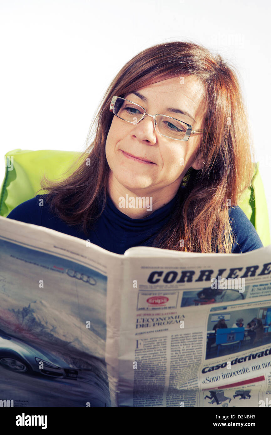 Happy smiling newspaper reading hi-res stock photography and images - Alamy