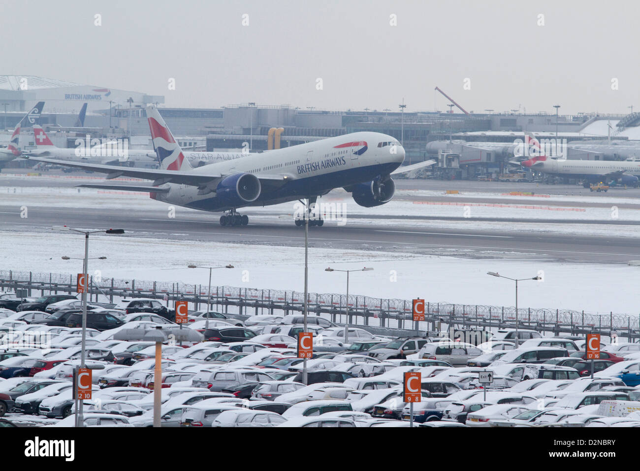 A British Airways commercial jet prepares to take off as Heathrow ...