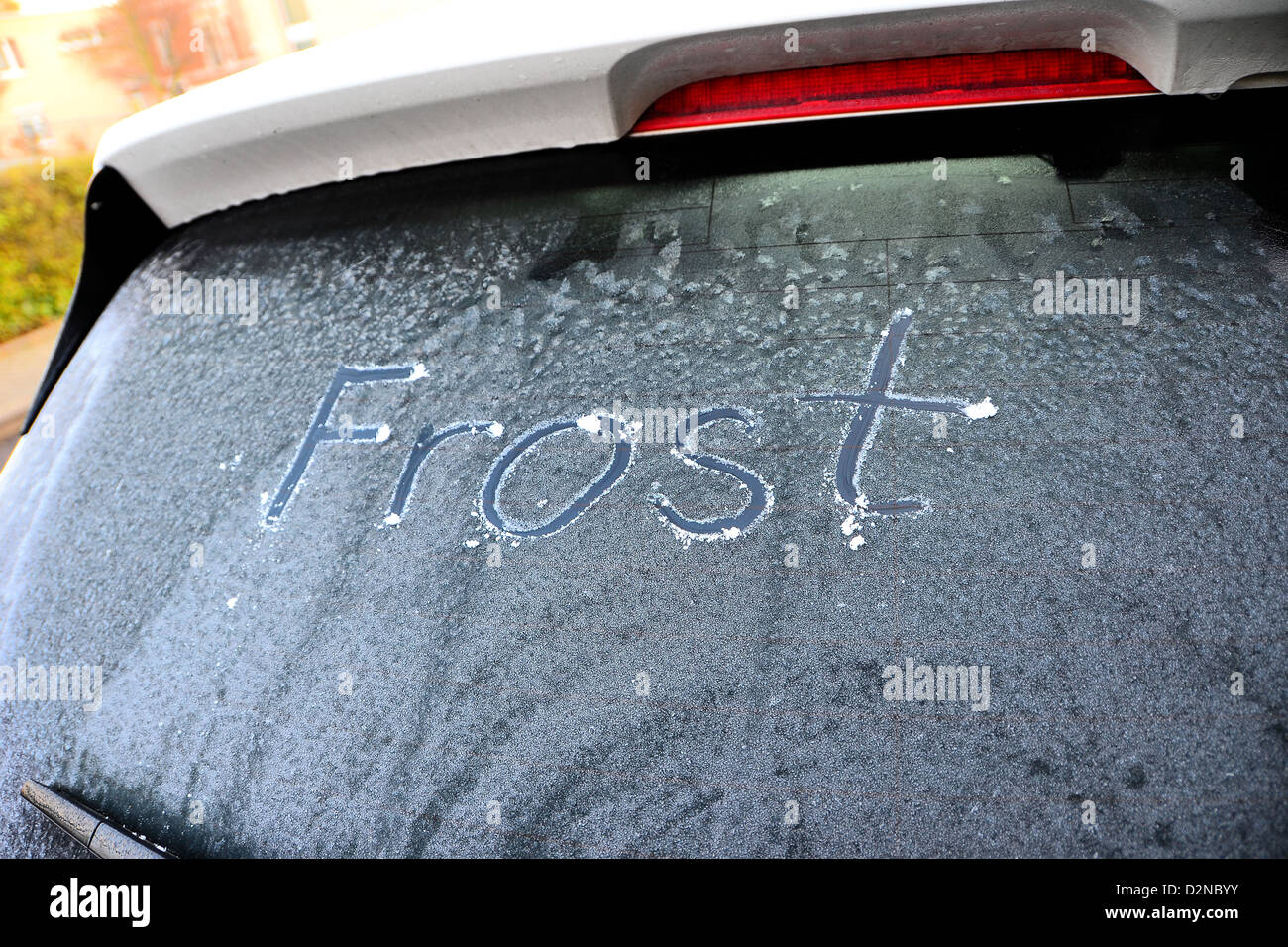 The word frost on a car window in winter Stock Photo - Alamy