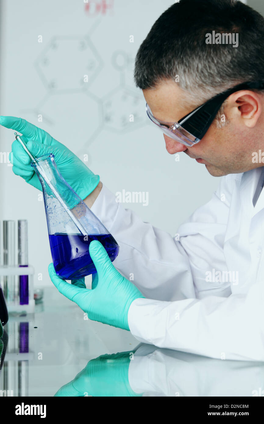 Chemistry Scientist conducting experiments in laboratory Stock Photo ...