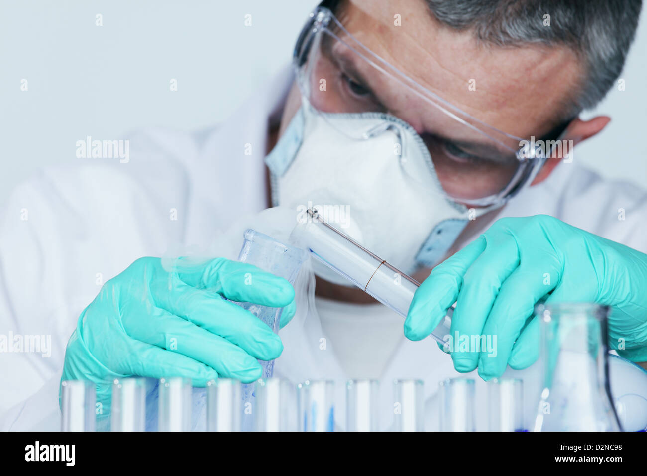 Chemistry Scientist conducting experiments in laboratory Stock Photo ...