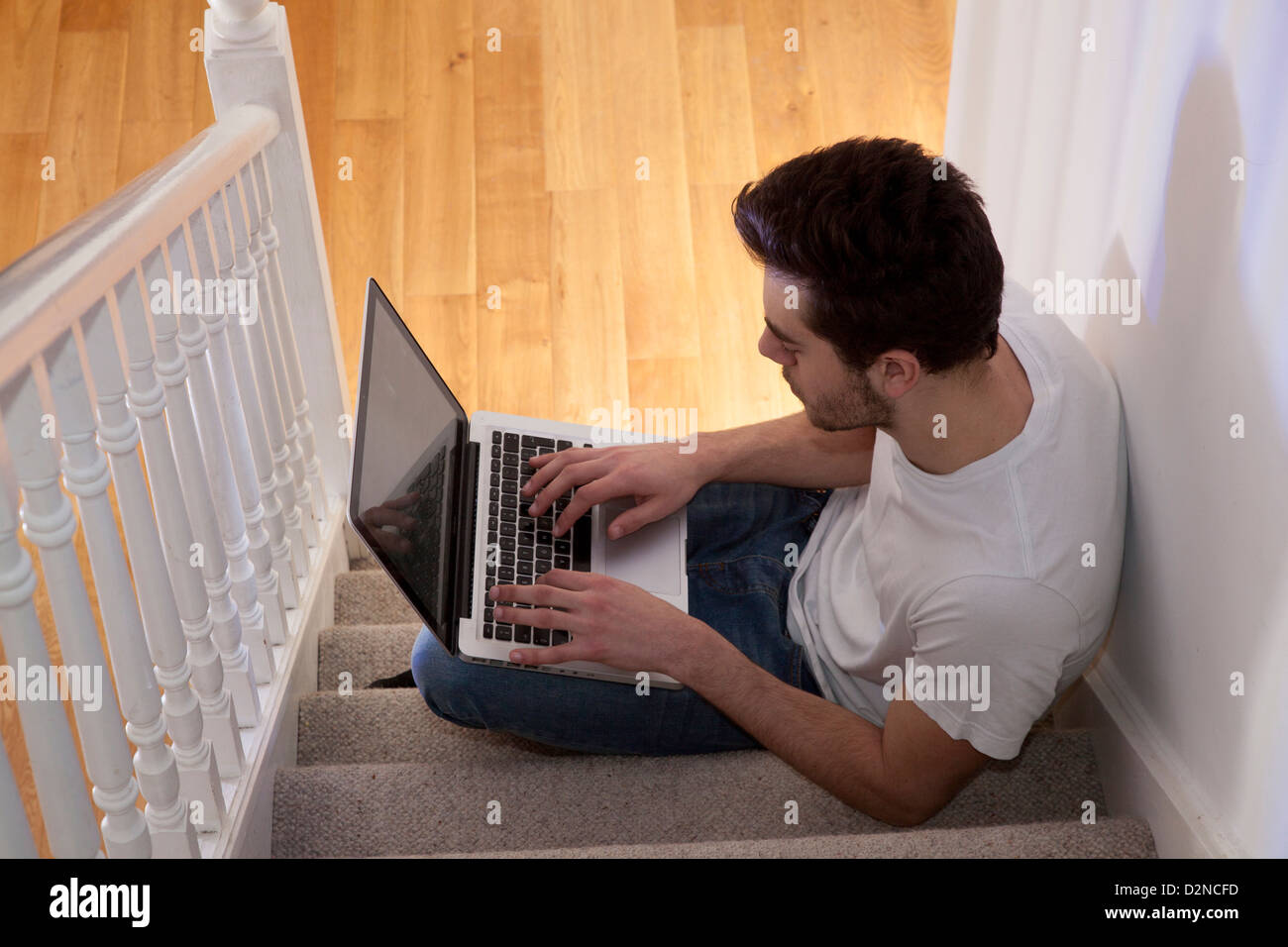 Teens reading computer book hi-res stock photography and images - Alamy