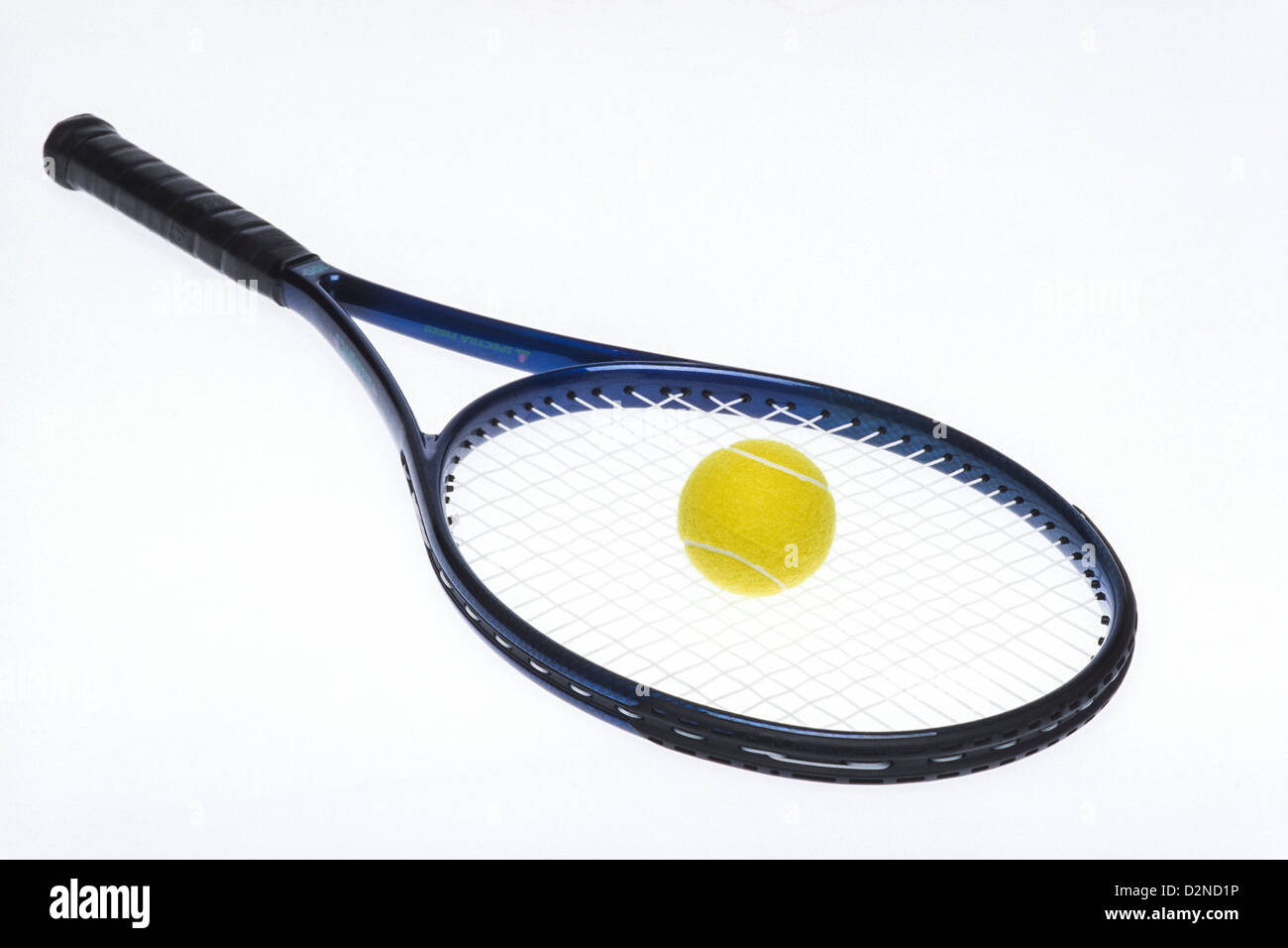 Tennis ball and racquet Stock Photo - Alamy