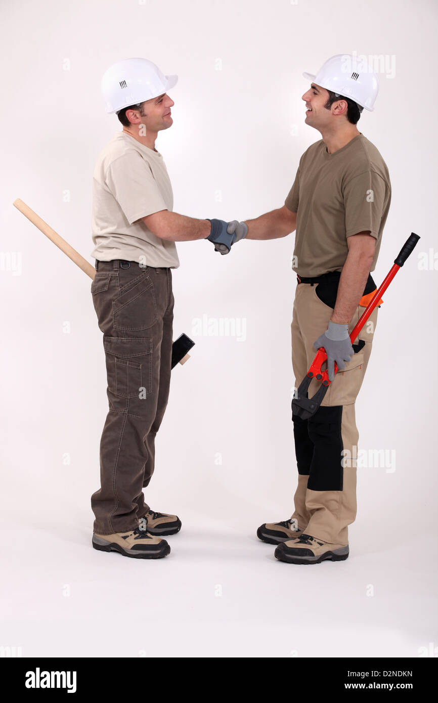 Construction workers shaking hands hi-res stock photography and images ...