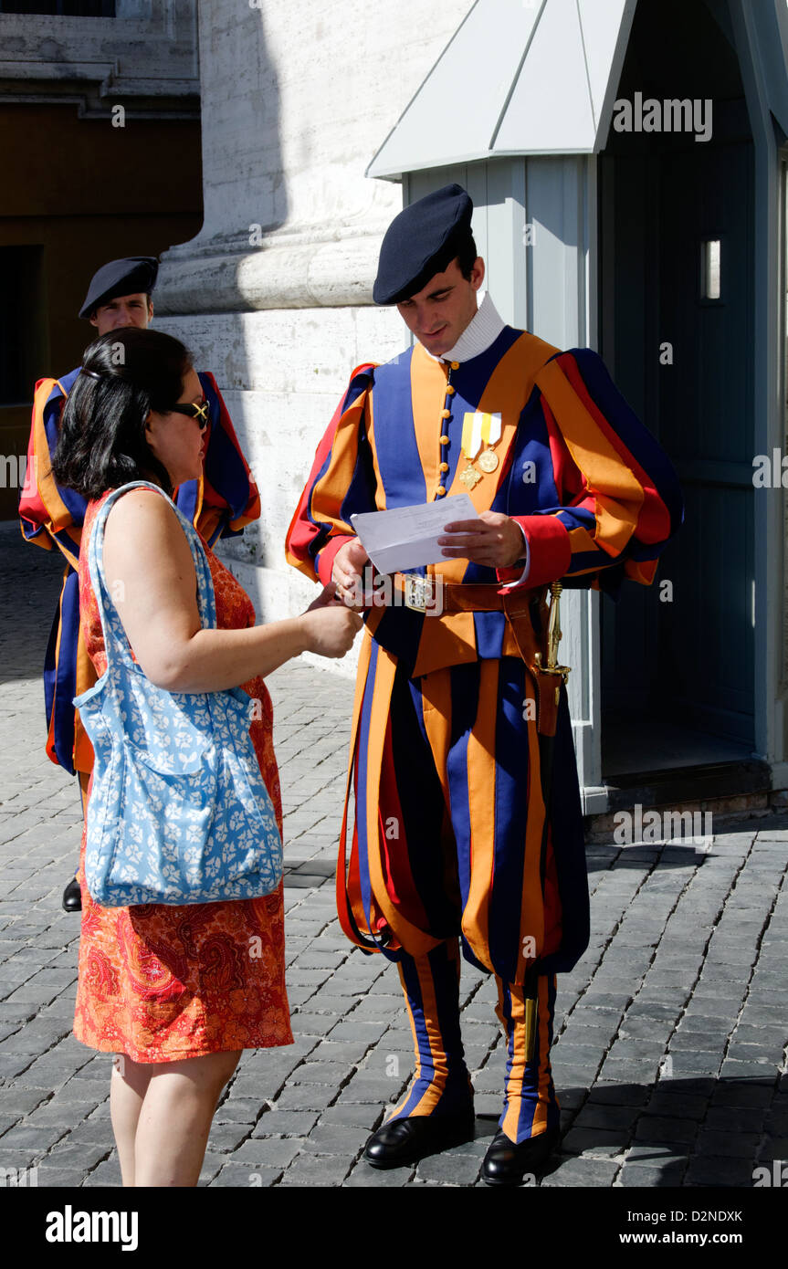 Swiss Guards at the entrance to the Vatican. Swiss Guards have been the ...