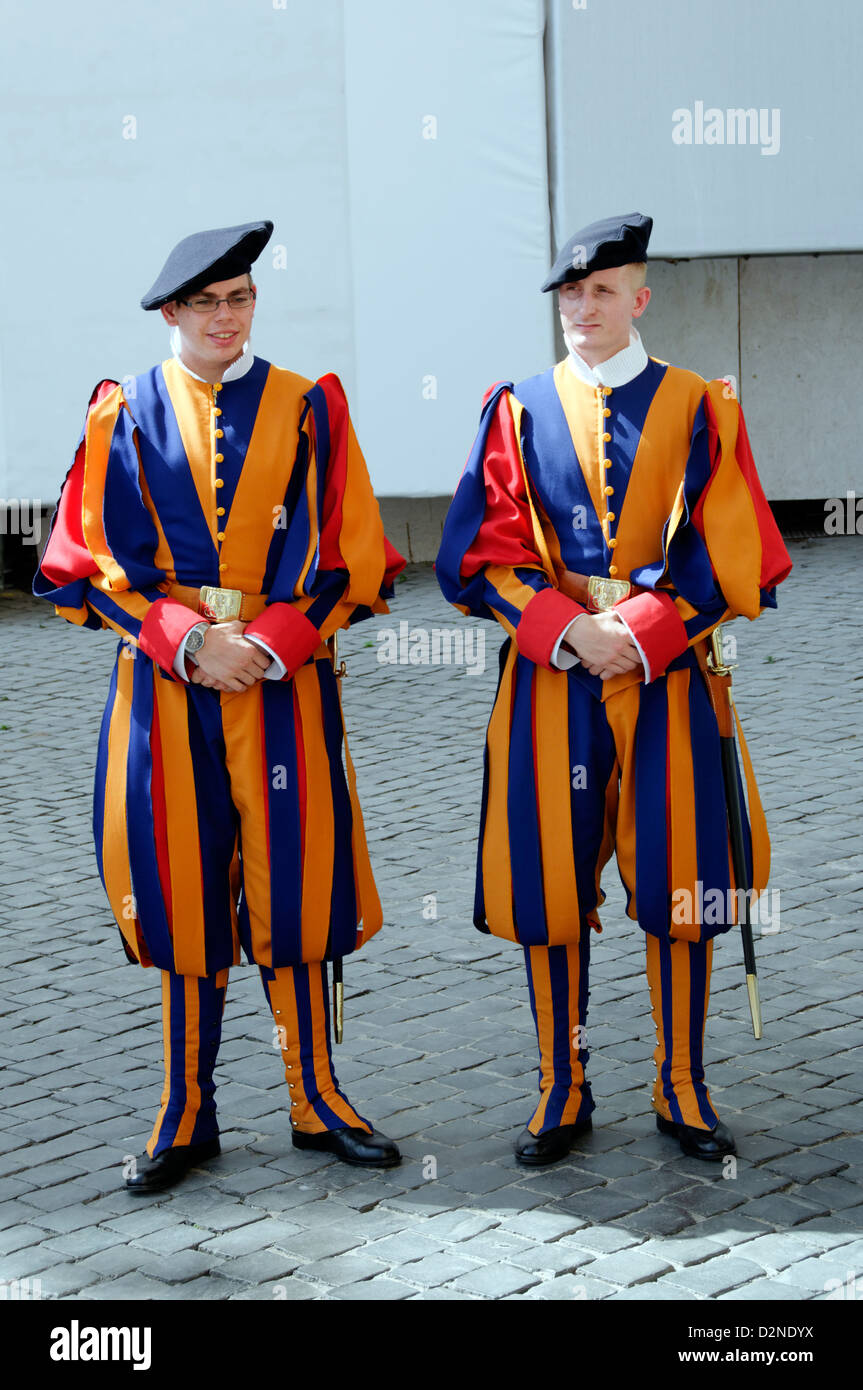 Swiss Guards at the entrance to the Vatican. Swiss Guards have been the ...