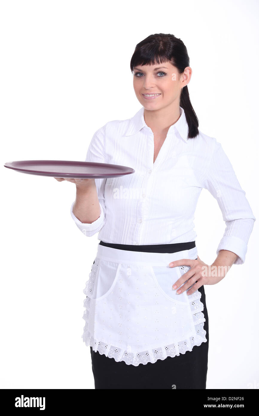 Waitress with an empty tray Stock Photo - Alamy