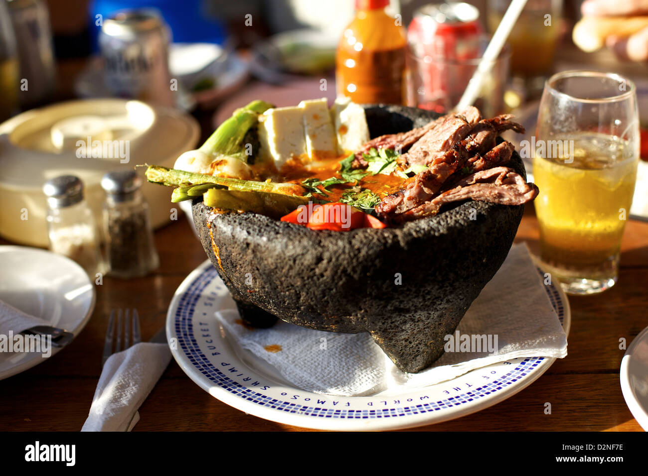 Molcajete meal with grilled steak, cheese, and vegetables in Mazatlan ...