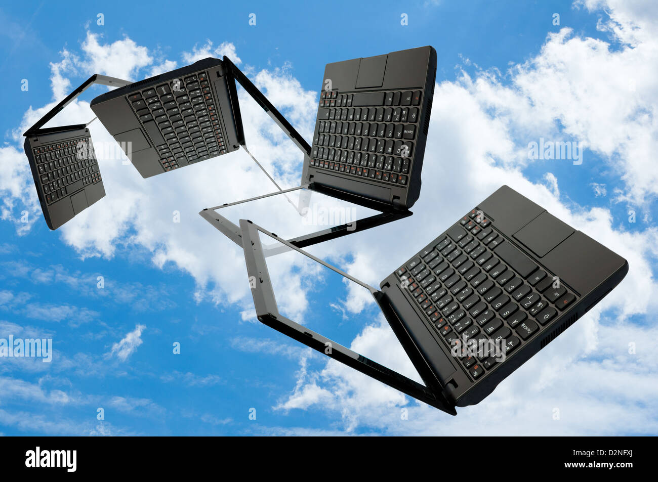 Cloud Computing - Flying Notebooks on Summer blue sky with clouds Stock ...