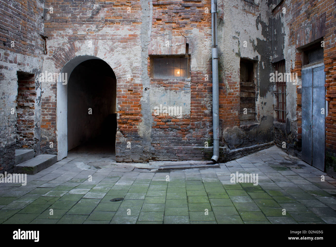 Grunge dark alley, slums of the city, squalid dirty corner of street in ...