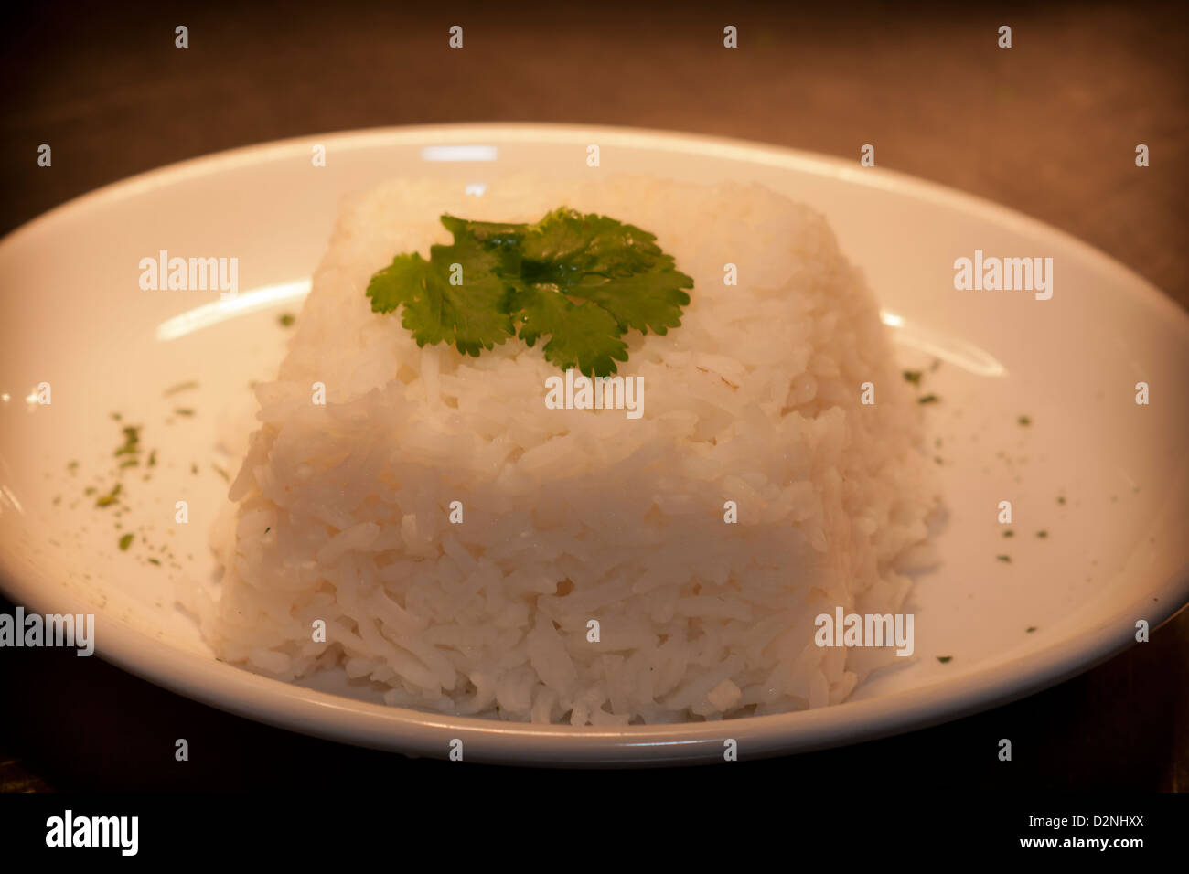portion of rice on a white plate Stock Photo - Alamy