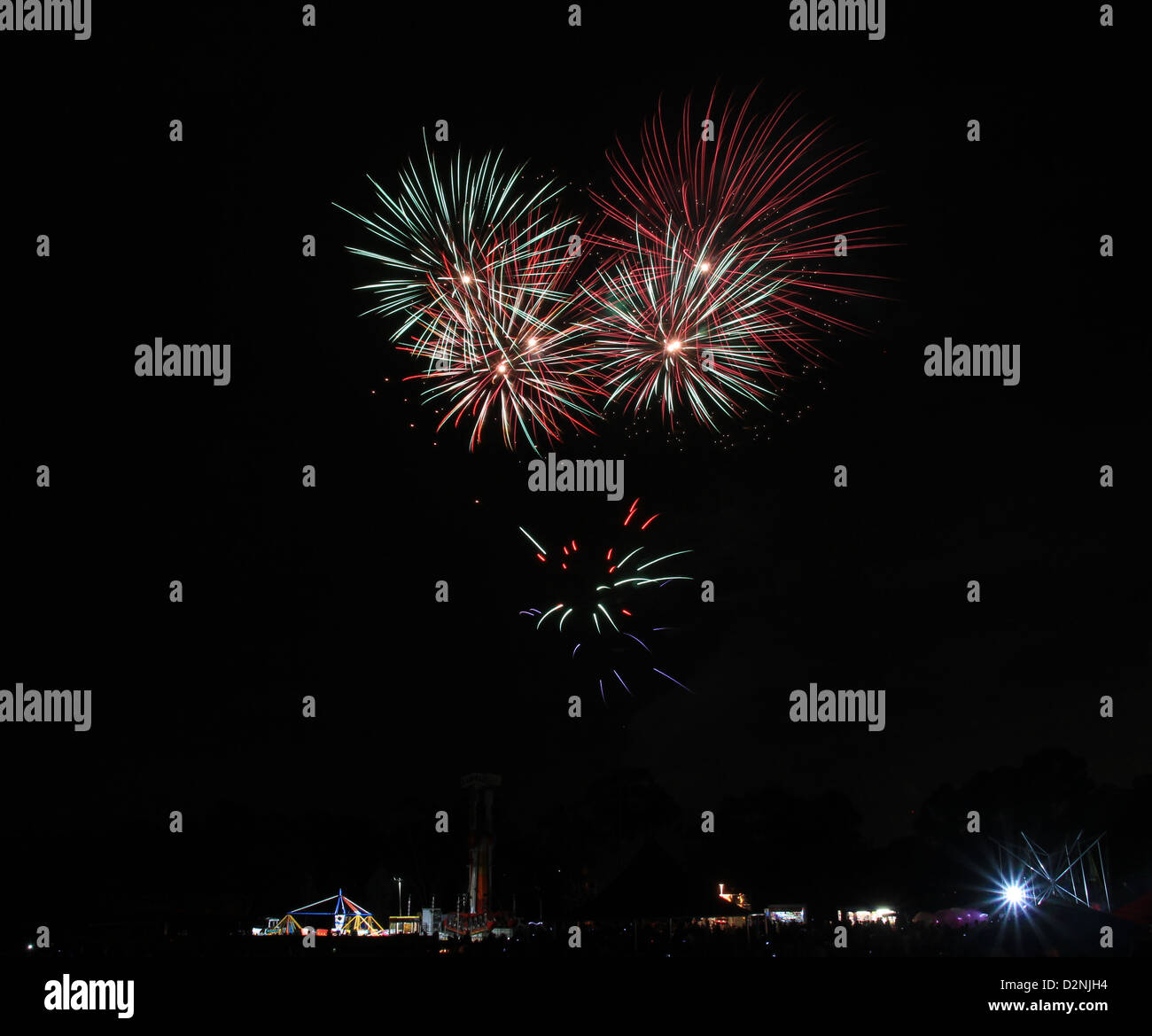 Amazing fireworks celebration in the hills with the carnival below ...