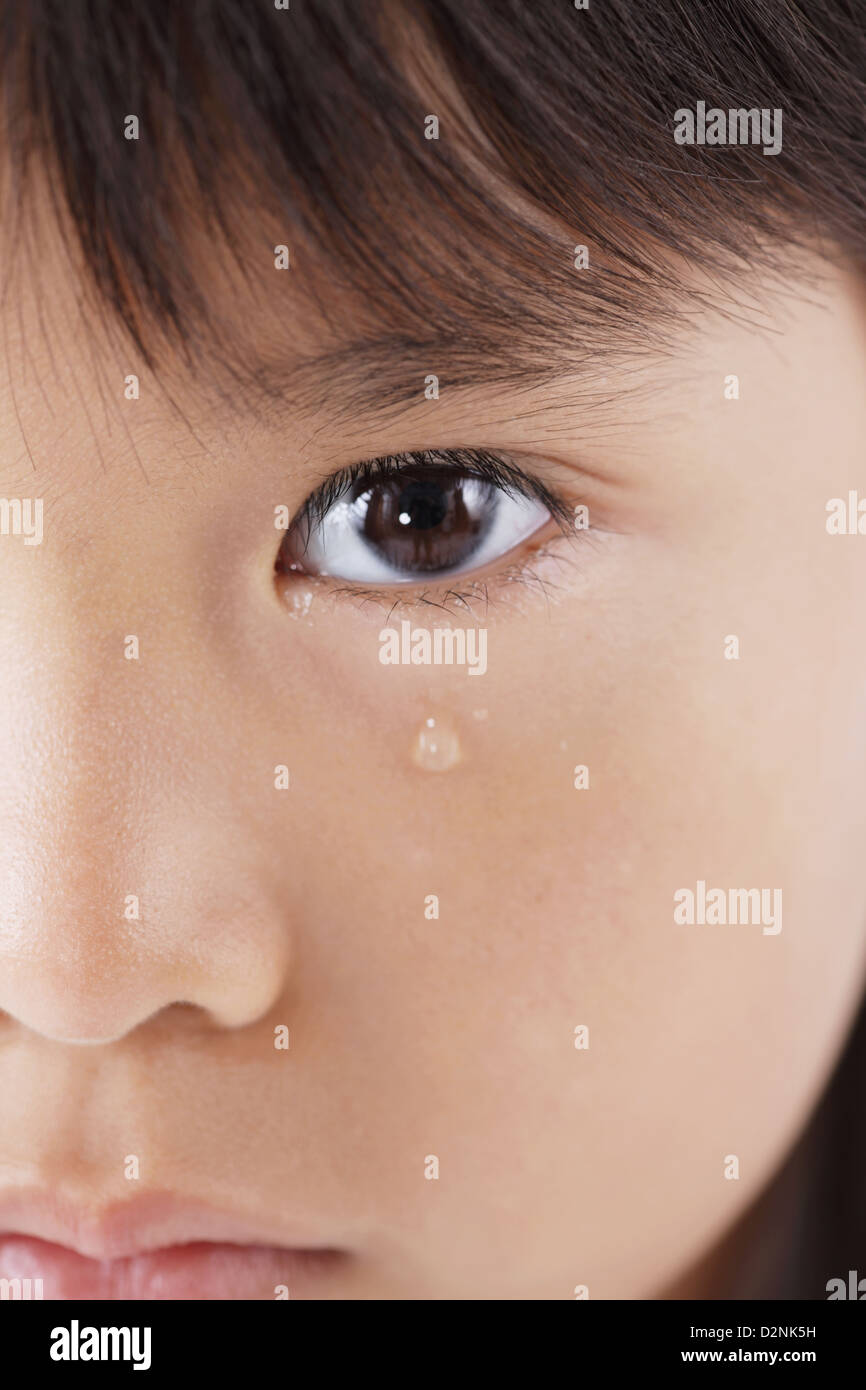 Close up of a crying girl face Stock Photo - Alamy