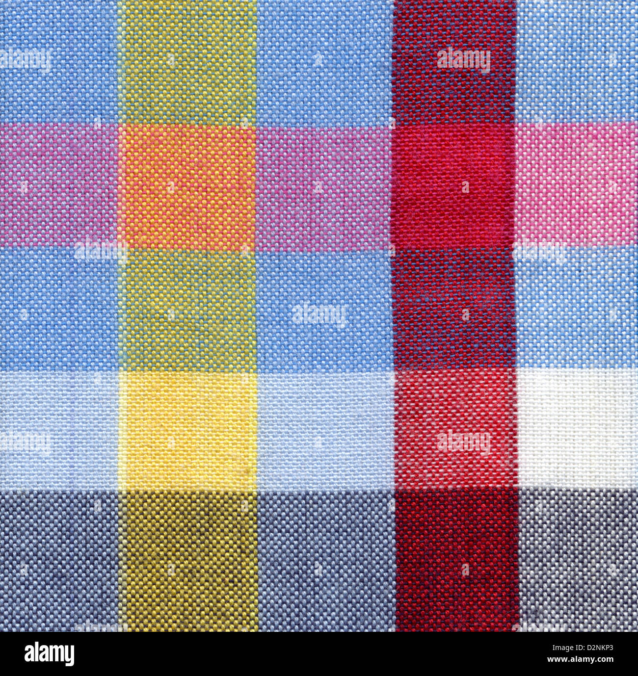 Blue, red and yellow square fabric pattern background Stock Photo - Alamy