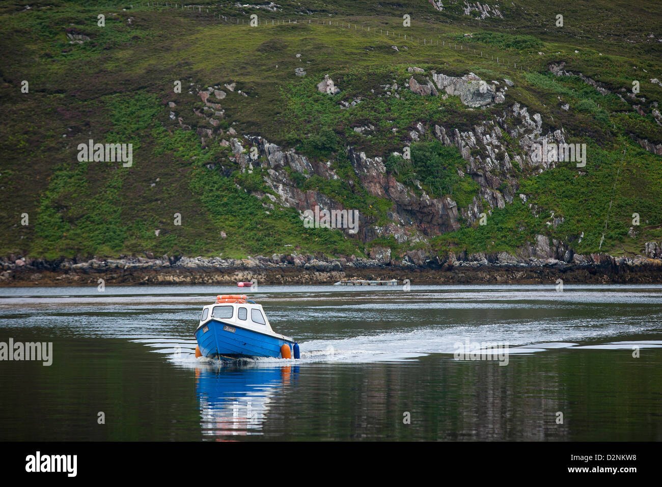 The passenger ferry crossing the Kyle of Durness, taking tourists to ...