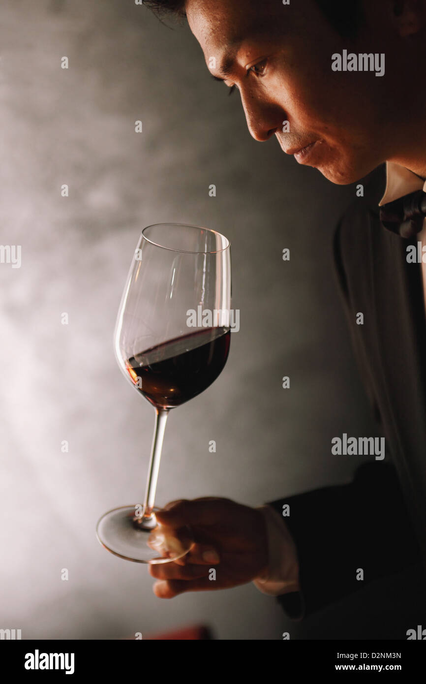 Sommelier tasting red wine Stock Photo - Alamy