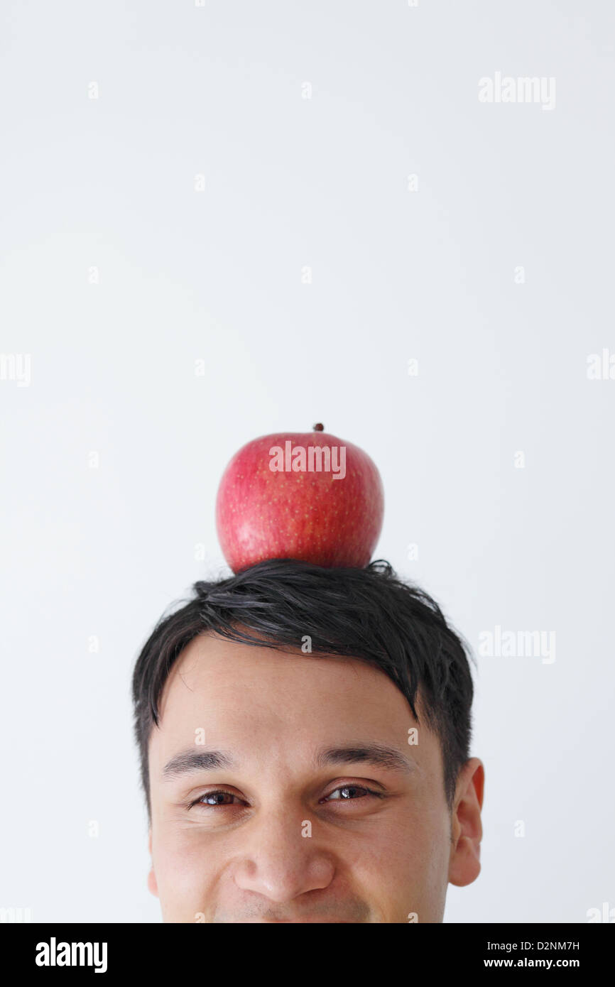 Businessman apple on head shot hi-res stock photography and images - Alamy