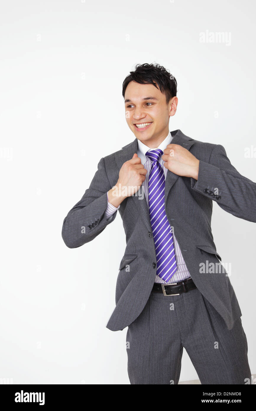Businessman wearing a jacket Stock Photo - Alamy