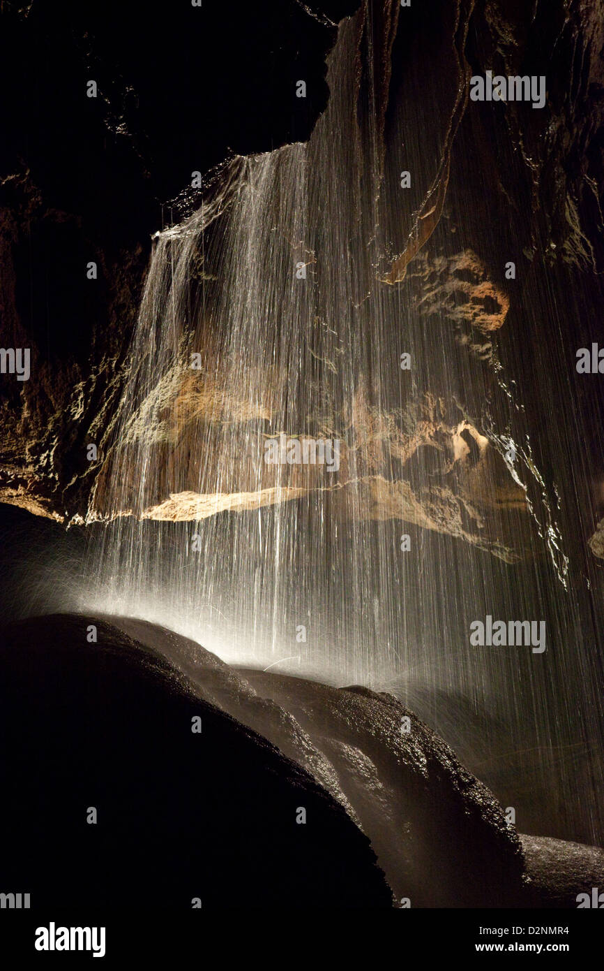 Underground waterfall, in a cave, giving abstract image of the stream ...