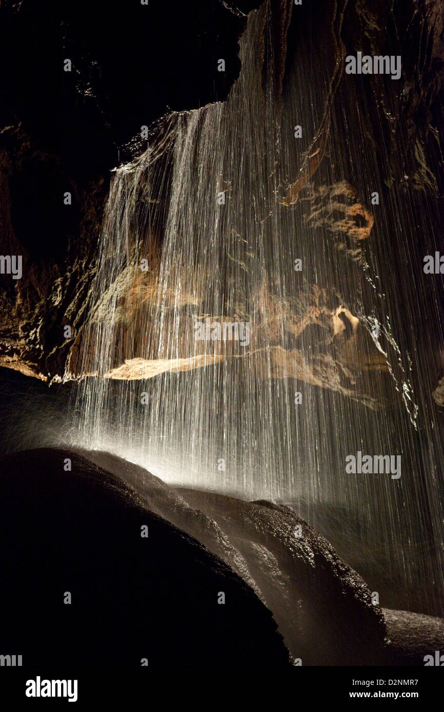 Underground waterfall, in a cave, giving abstract image of the stream ...