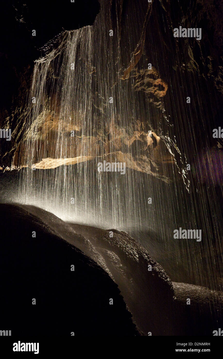 Underground waterfall, in a cave, giving abstract image of the stream ...