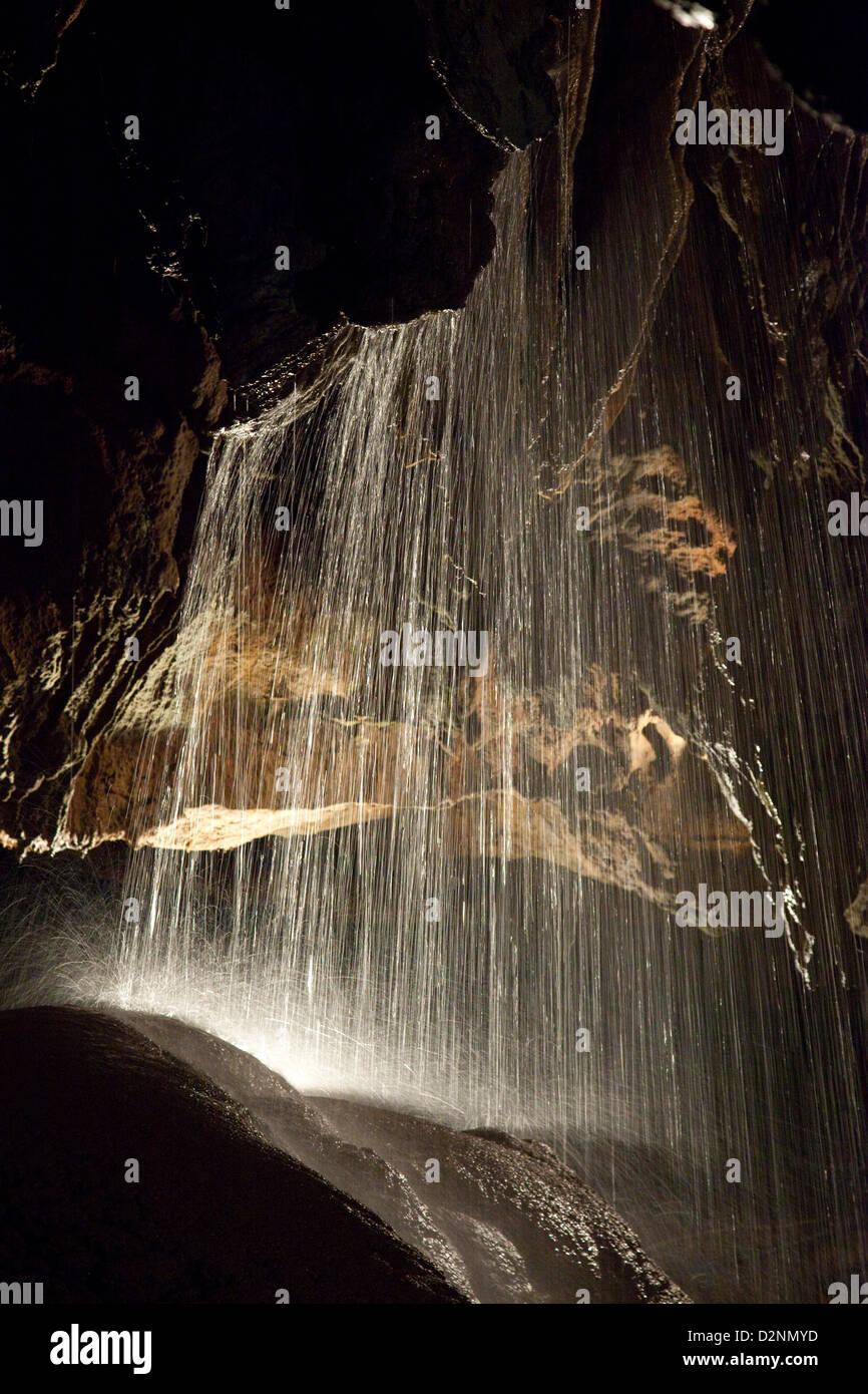 Underground waterfall, in a cave, giving abstract image of the stream ...