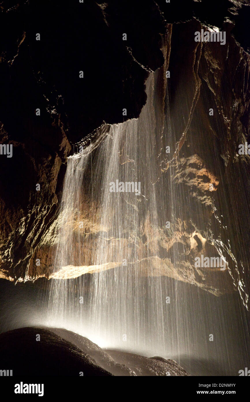Underground waterfall, in a cave, giving abstract image of the stream ...