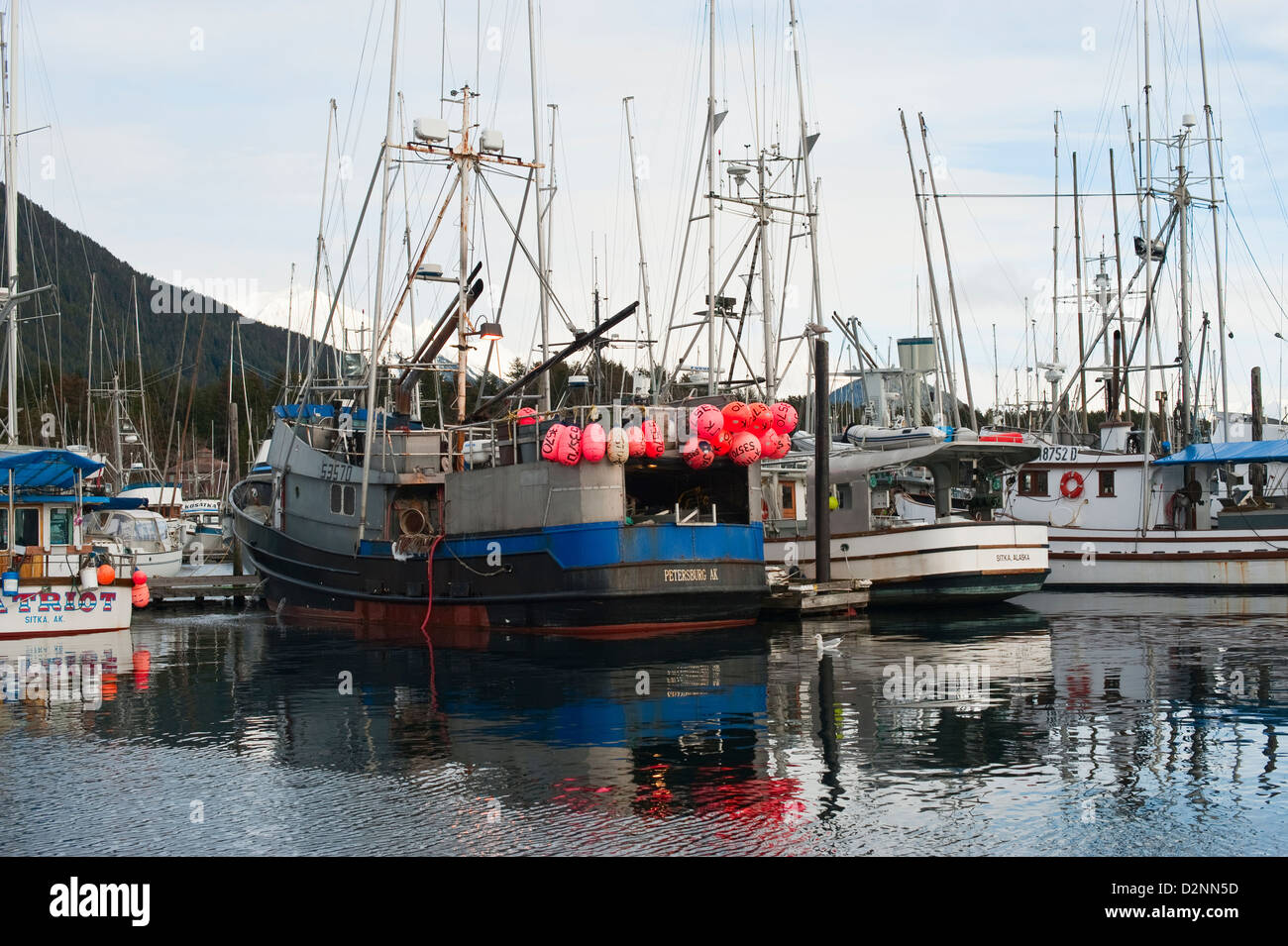 Commercial fishing fleet docked in Crescent Harbor, Sitka, Alaska, USA ...
