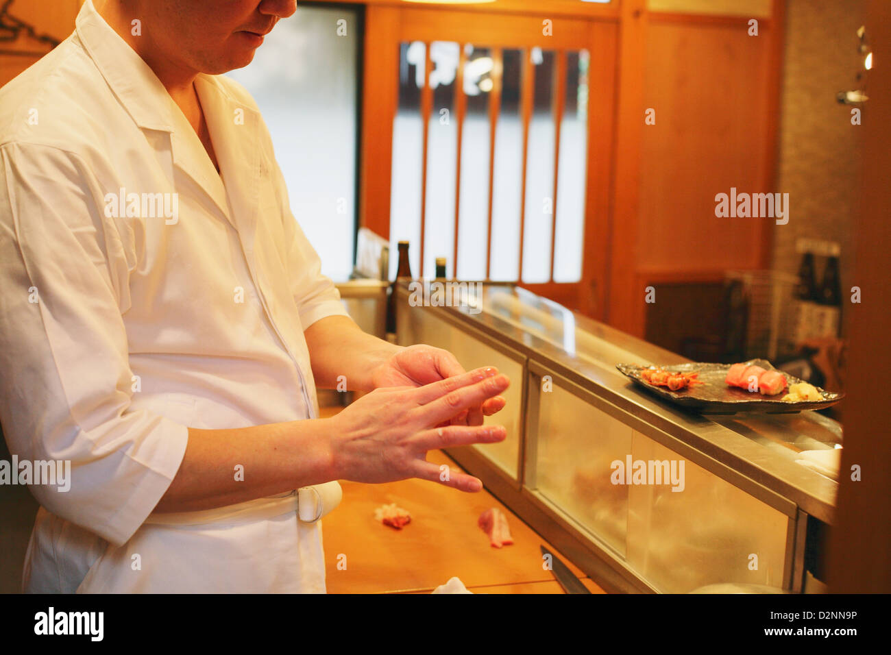 Professional sushi chef preparing hi-res stock photography and images ...