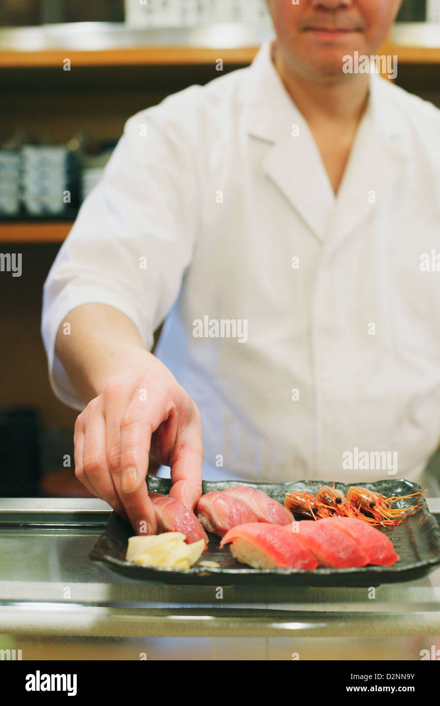Chef preparing sushi Stock Photo - Alamy