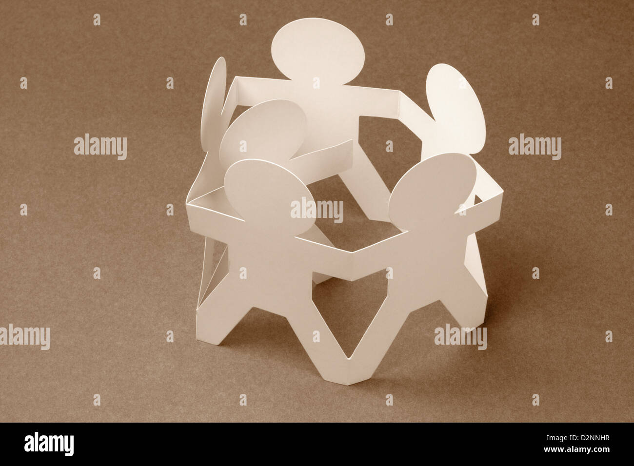 Circle of paper chain people hi-res stock photography and images - Alamy