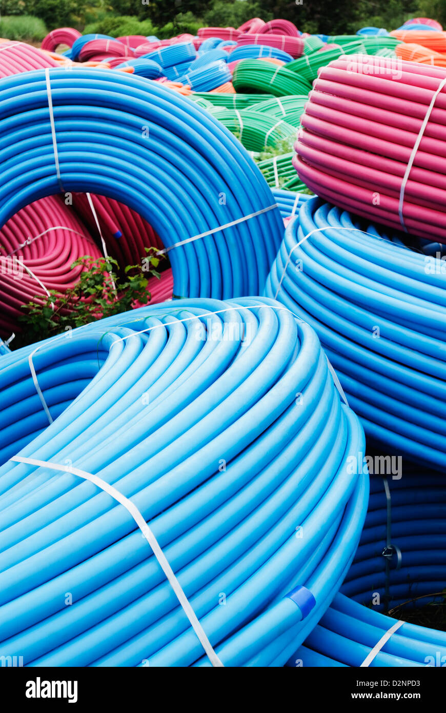 Rolls of plastic pipes, Mysore, Karnataka, India Stock Photo - Alamy
