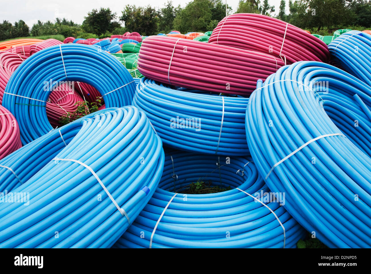Rolls of plastic pipes, Mysore, Karnataka, India Stock Photo - Alamy