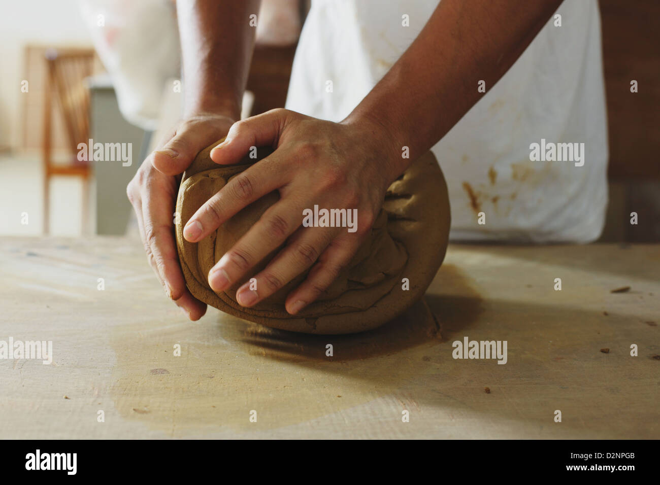 Craftsman working clay Stock Photo - Alamy