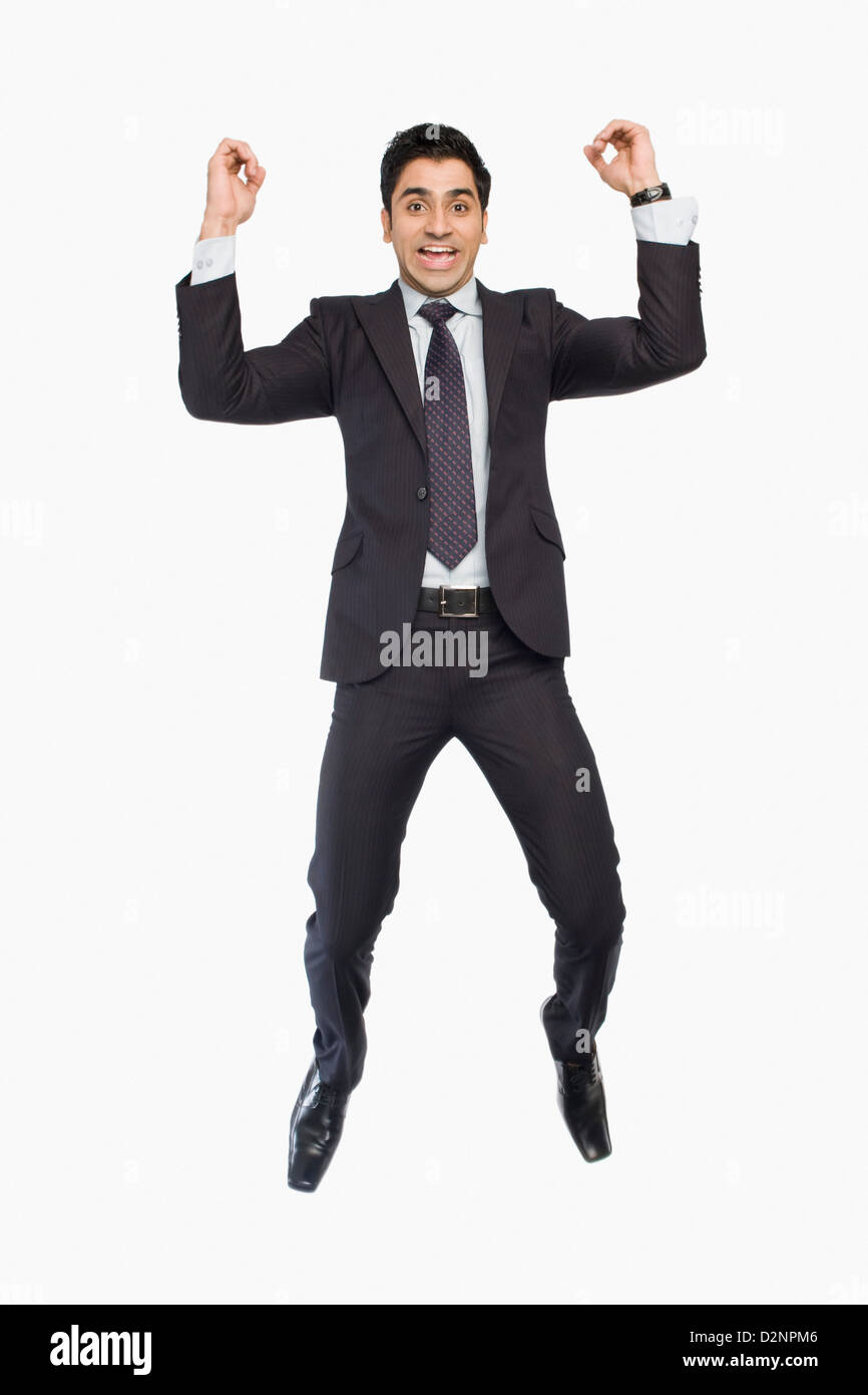 Portrait of a businessman cheering Stock Photo - Alamy