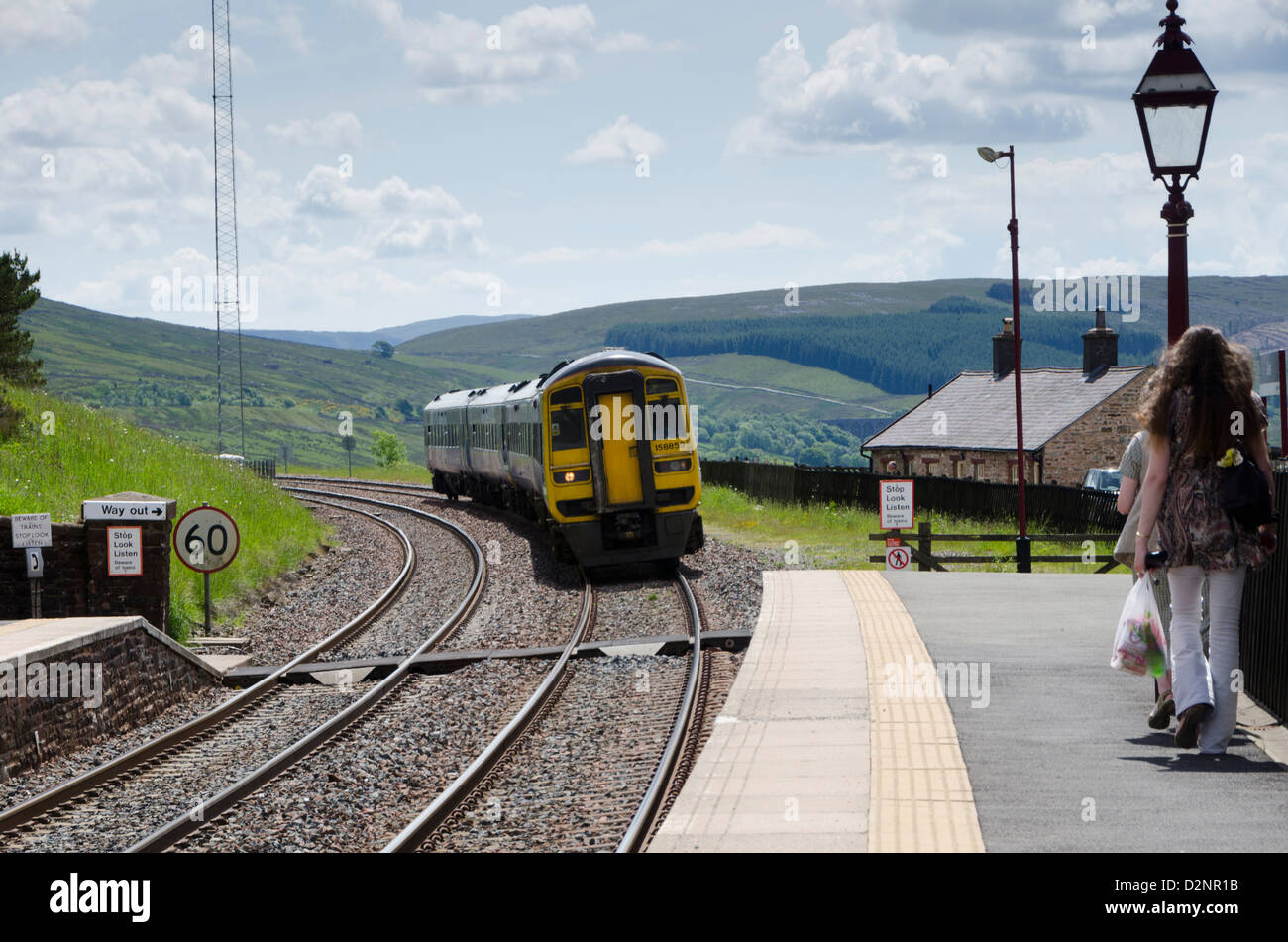 Passenger train arriving at Dent railway Station, Cumbria, England ...