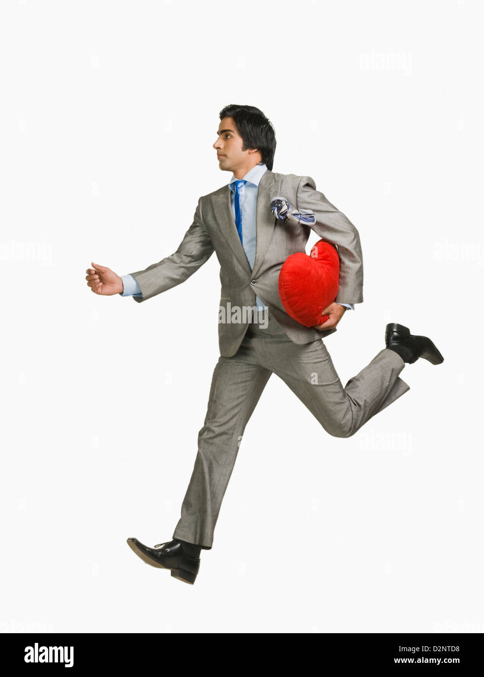 Carrying under arm Cut Out Stock Images & Pictures - Alamy