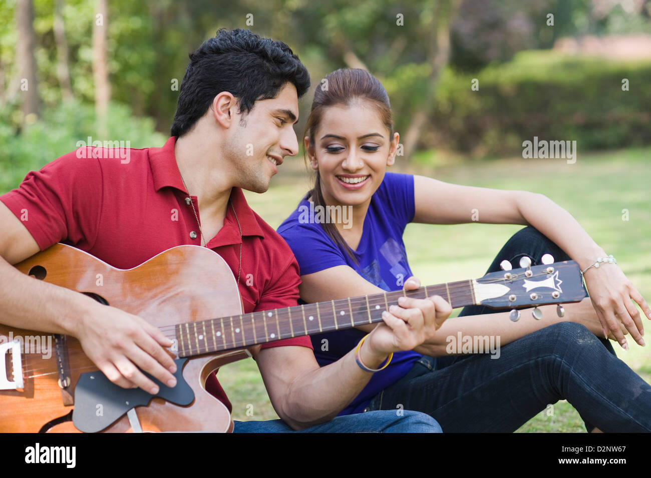 Two women sitting down beside hi-res stock photography and images - Alamy