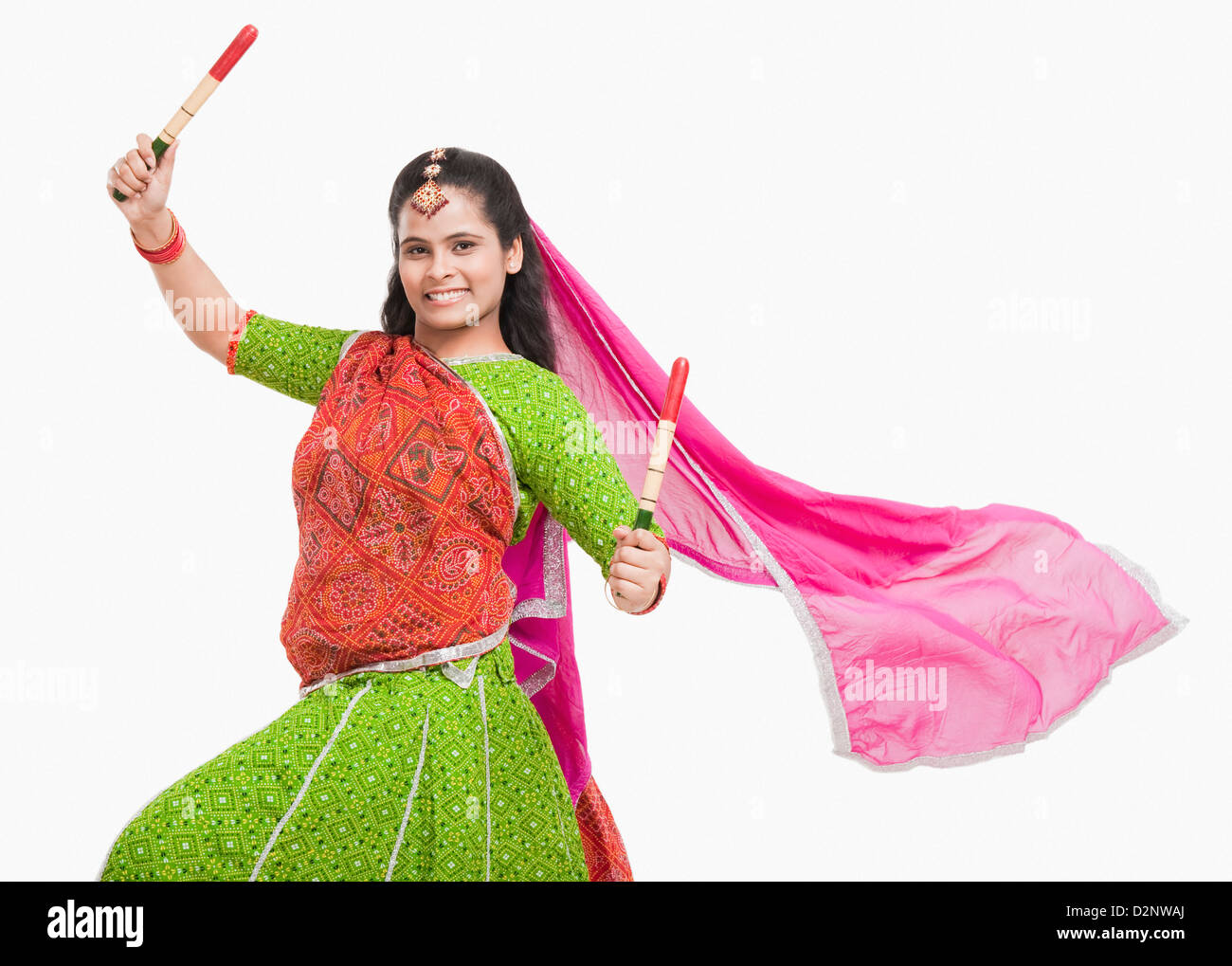 Performing dandiya raas hi-res stock photography and images - Alamy
